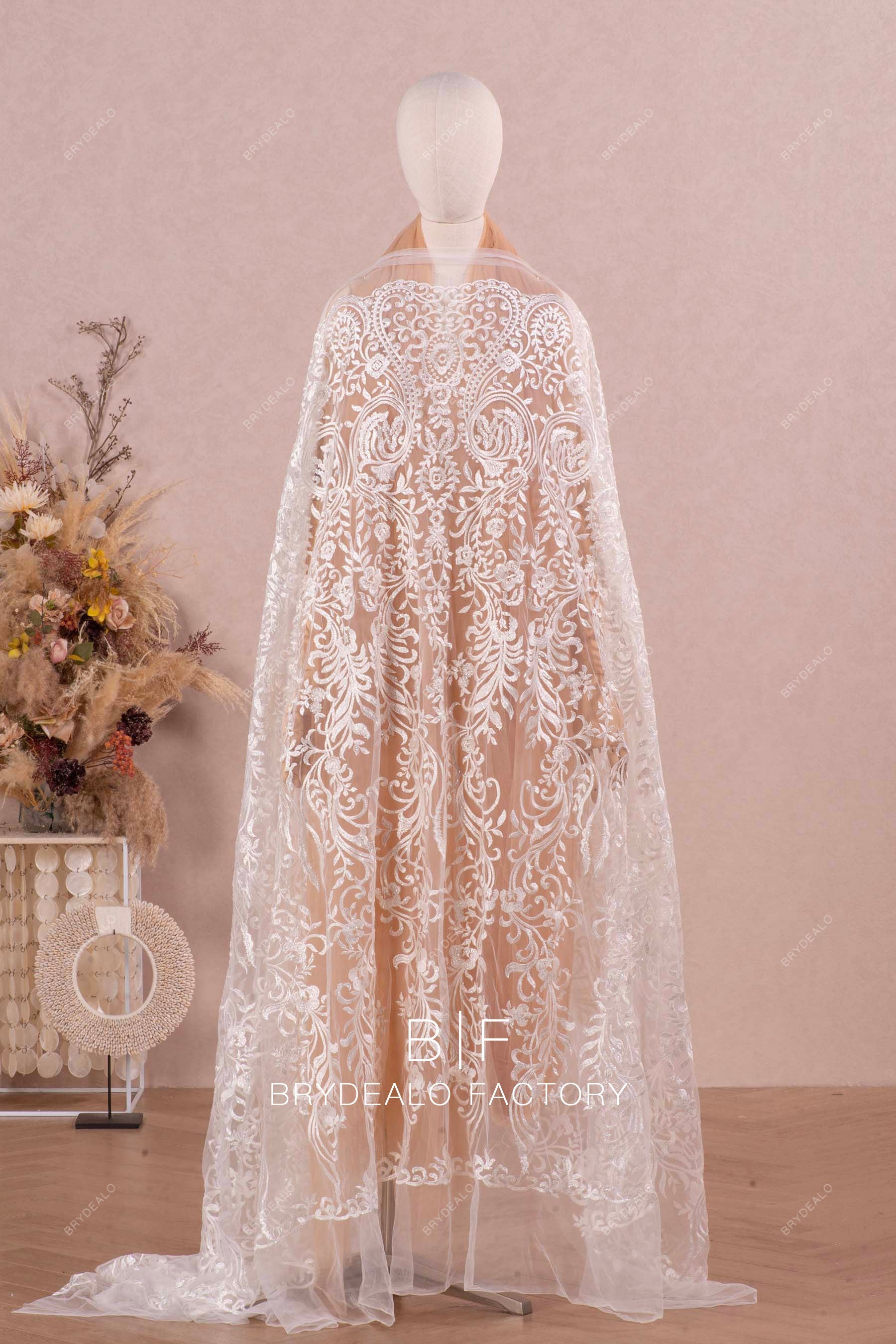 Designer Shimmer Totem Motif Embroidered Lace Online